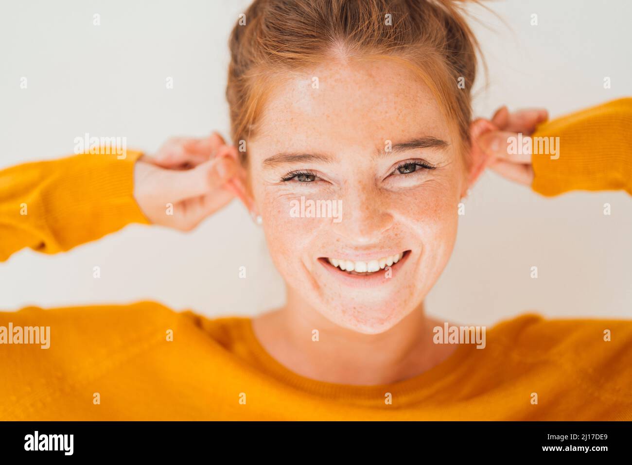 Ear pulling hi-res stock photography and images - Alamy