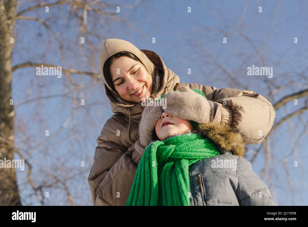 Mother covering child eyes hi-res stock photography and images - Alamy