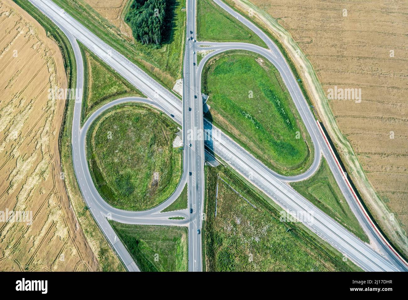 roundabout in the middle of agricultural grain fields. aerial view in ...