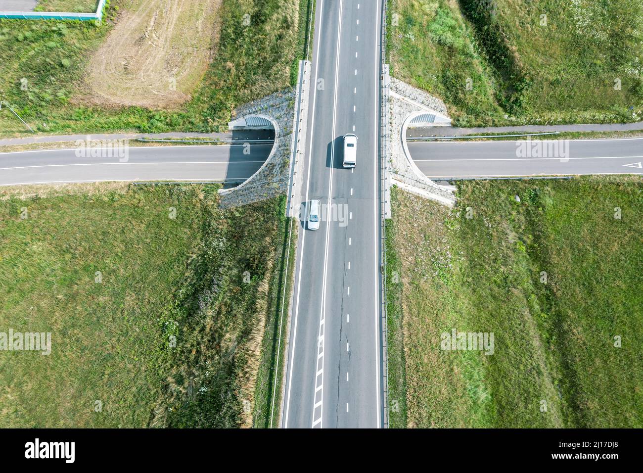bridge over highway road. sunny countryside landscape. top view aerial ...