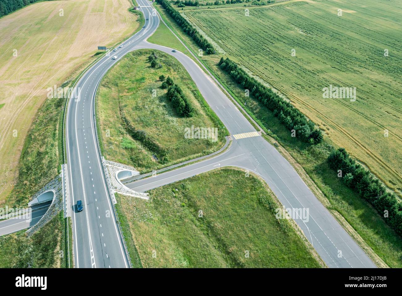 Country road among fields hi-res stock photography and images - Alamy