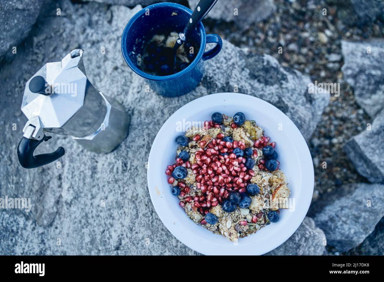 Coffee and muesli on rock Stock Photo - Alamy