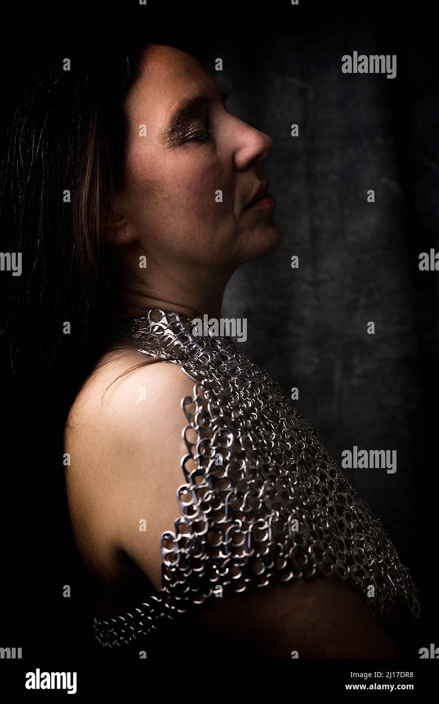 woman with metallic armor made with recycled cans XI Stock Photo - Alamy