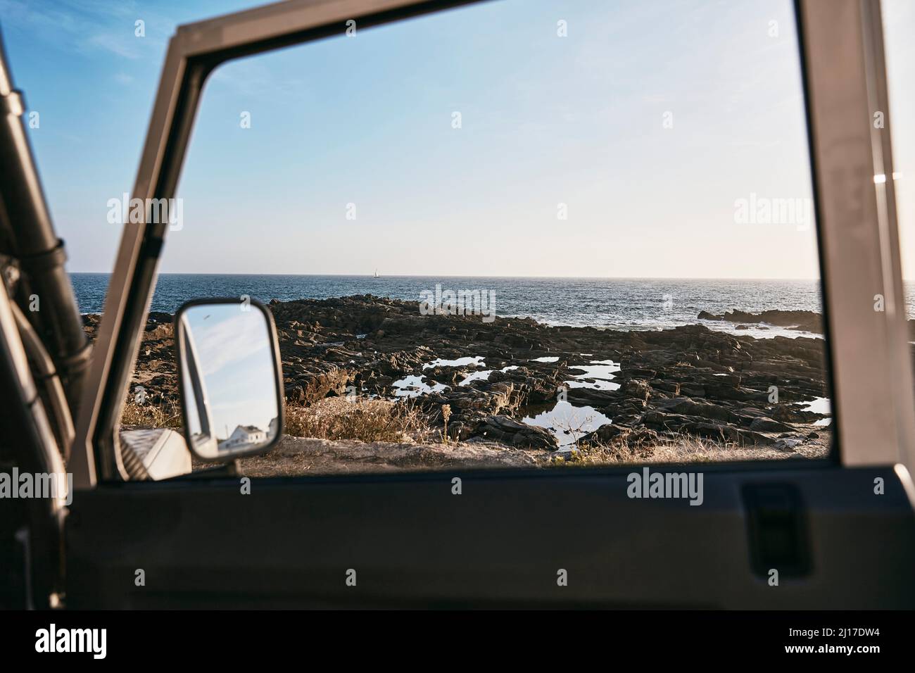 Sea view seen through car window Stock Photo - Alamy