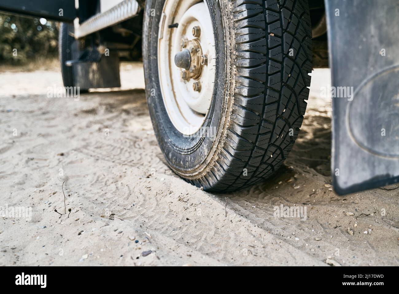 Off-road vehicle tires in sand Stock Photo - Alamy