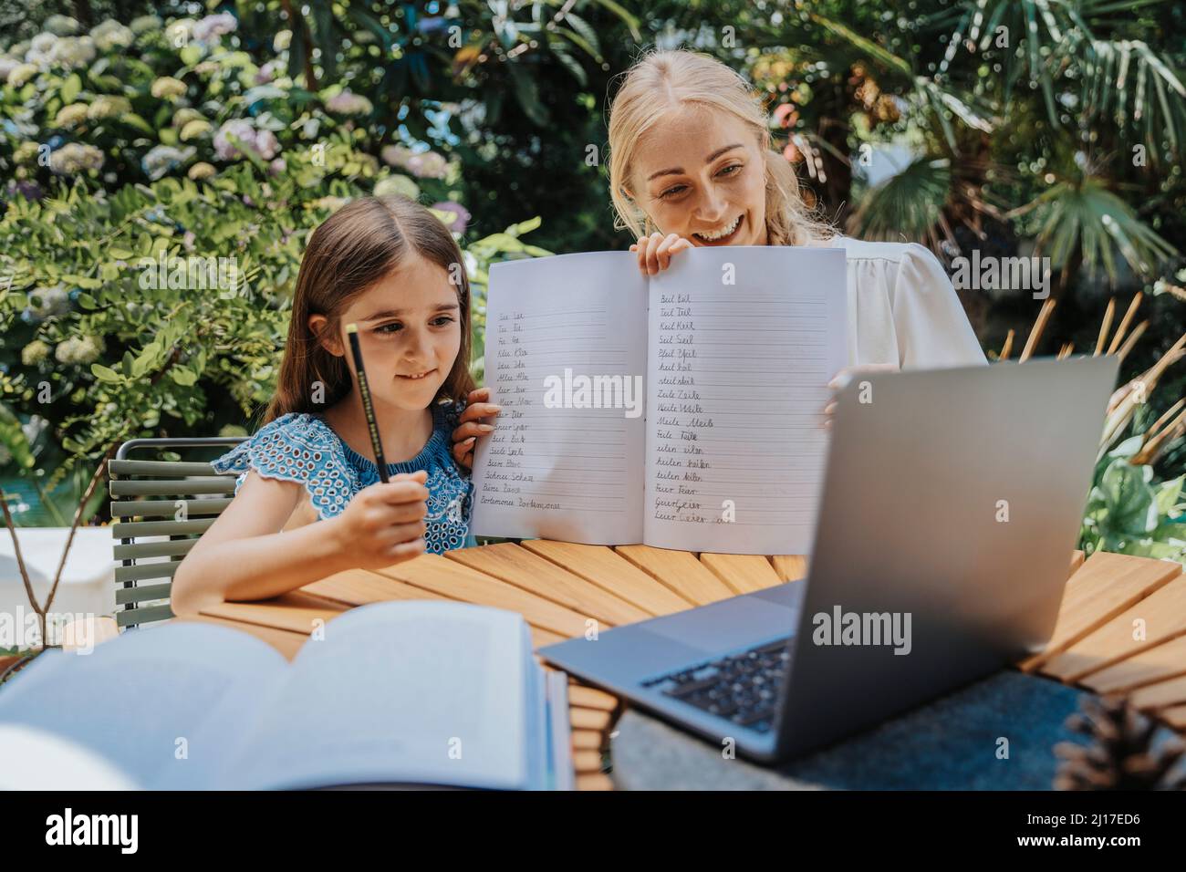 Child showing homework parent hi-res stock photography and images - Alamy