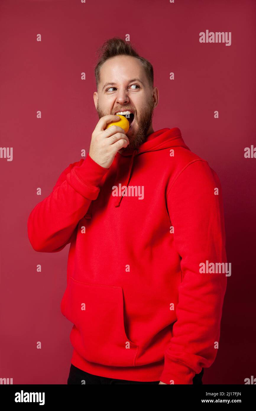 Lemon eating hi-res stock photography and images - Alamy