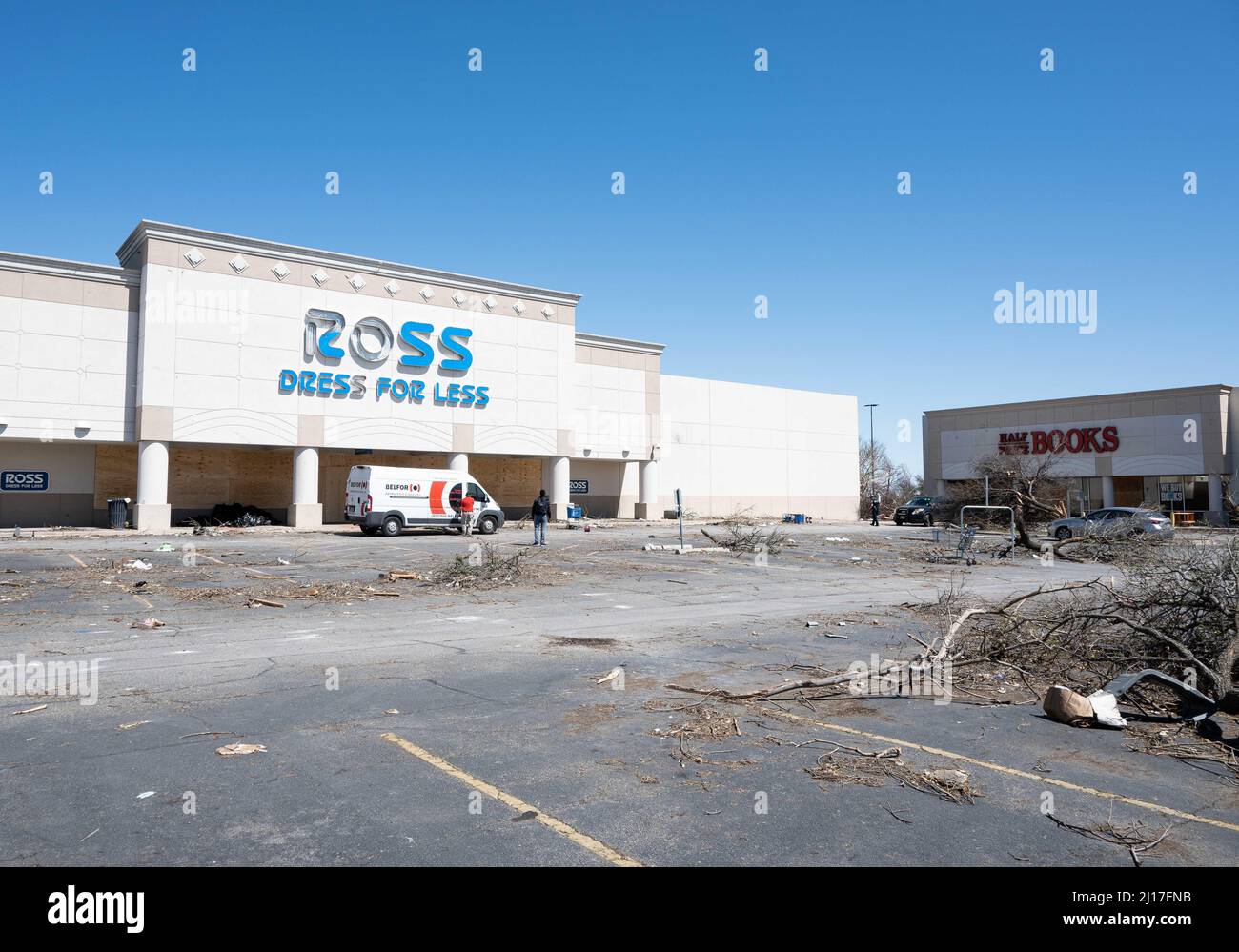Restoration crews clean up damage to Ross and Half Priced Books stores ...