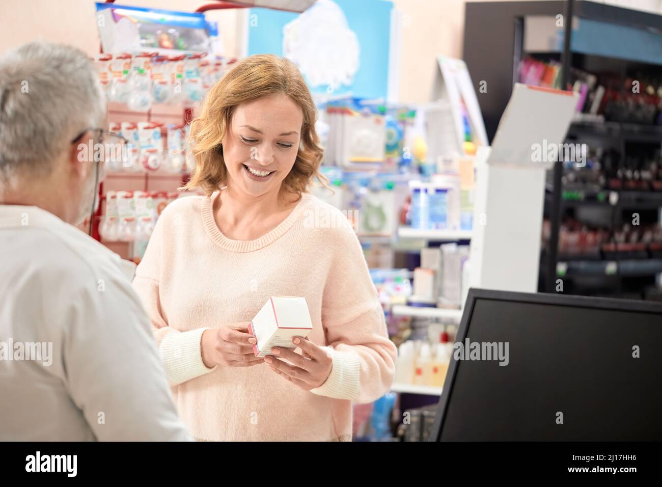 Customer standing at counter hi-res stock photography and images - Alamy