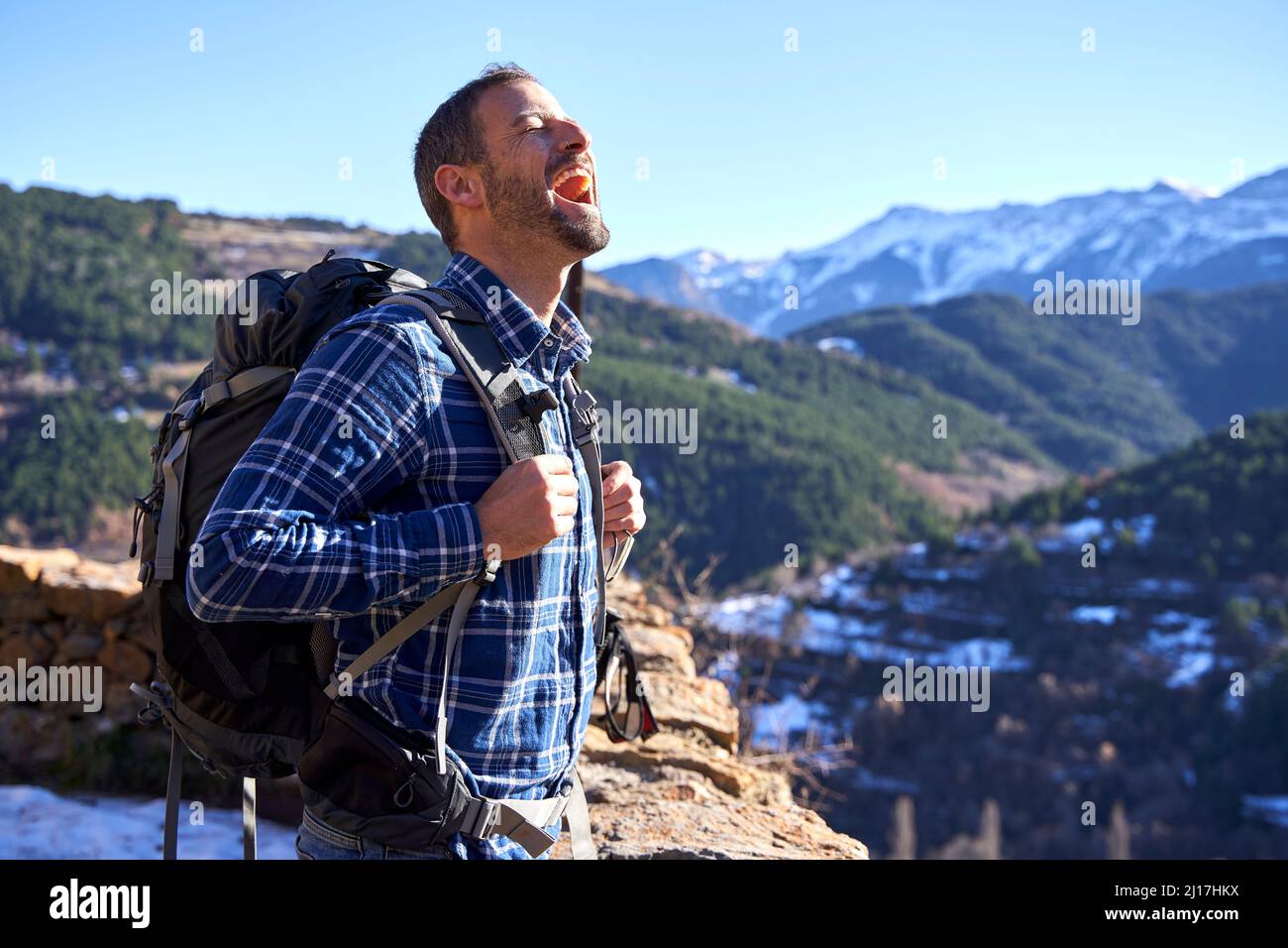Happy wan with mouth open on sunny day Stock Photo - Alamy