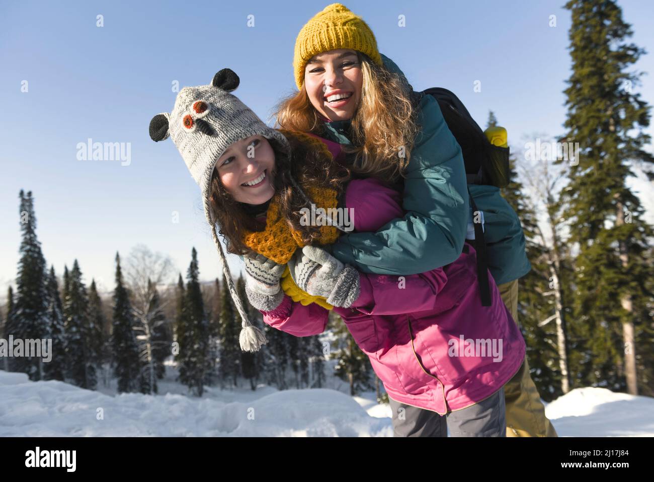 Portrait smiling friends carrying hi-res stock photography and images ...