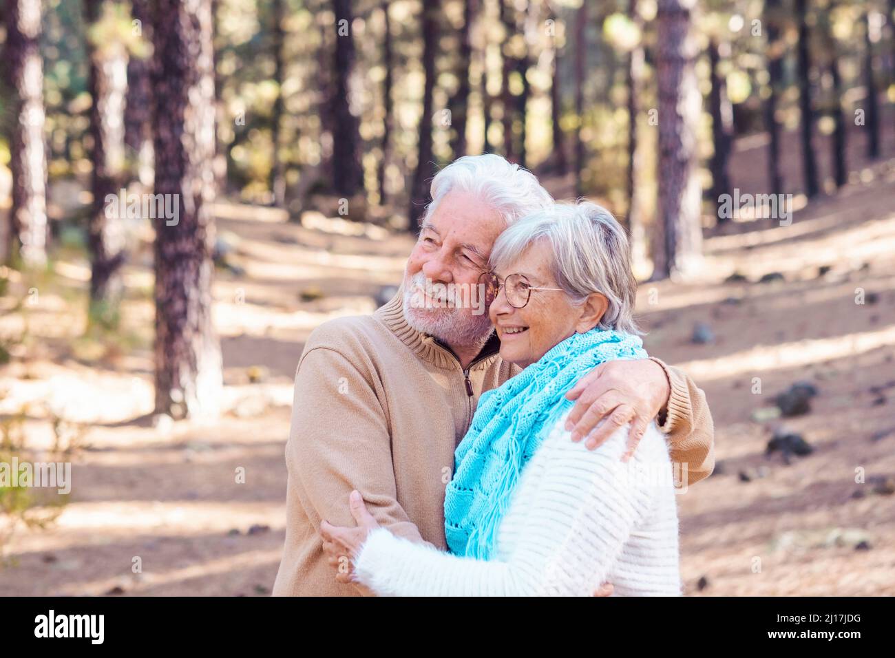 Seniors in their 70s hugging each other hi-res stock photography and ...