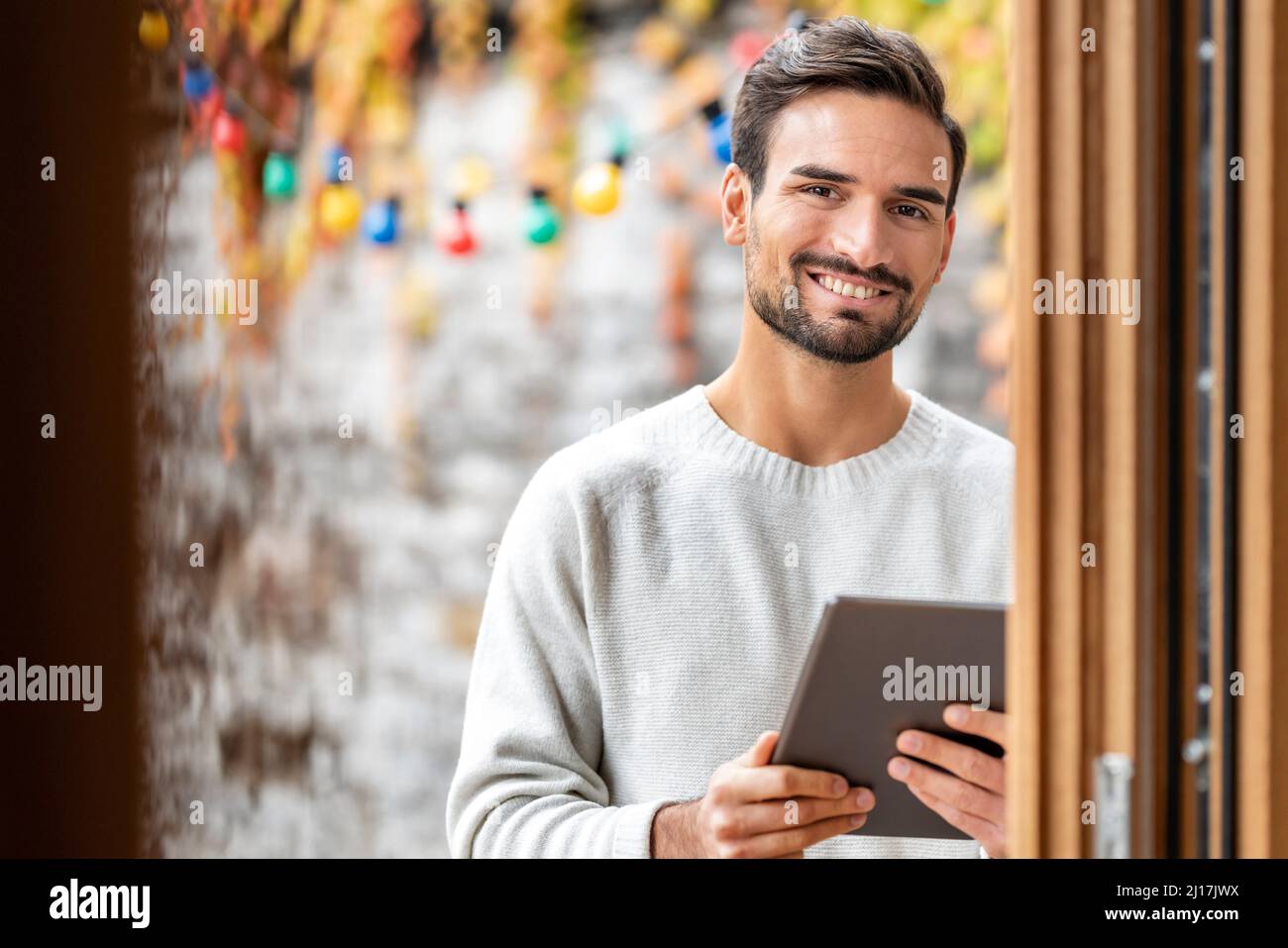 Handsome young man working tablet hi-res stock photography and images ...