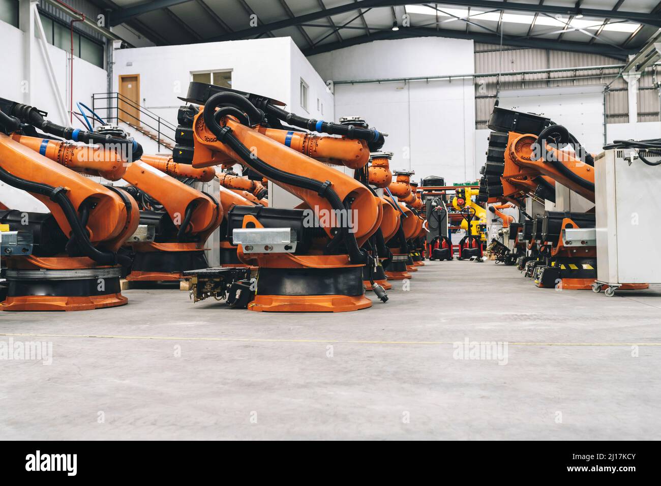 Manufacturing machines in warehouse at factory Stock Photo - Alamy