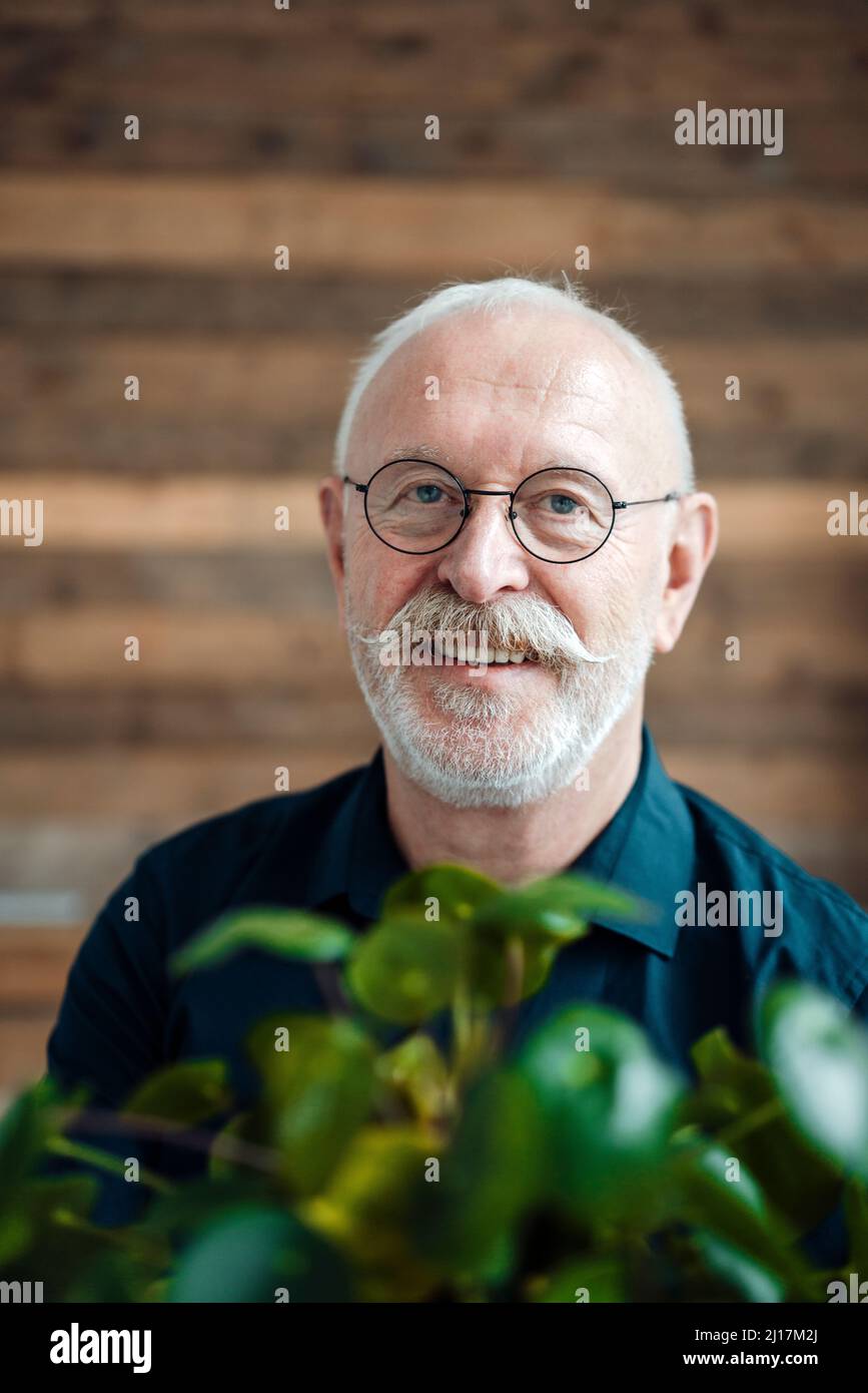 Happy businessman standing behind hi-res stock photography and images ...