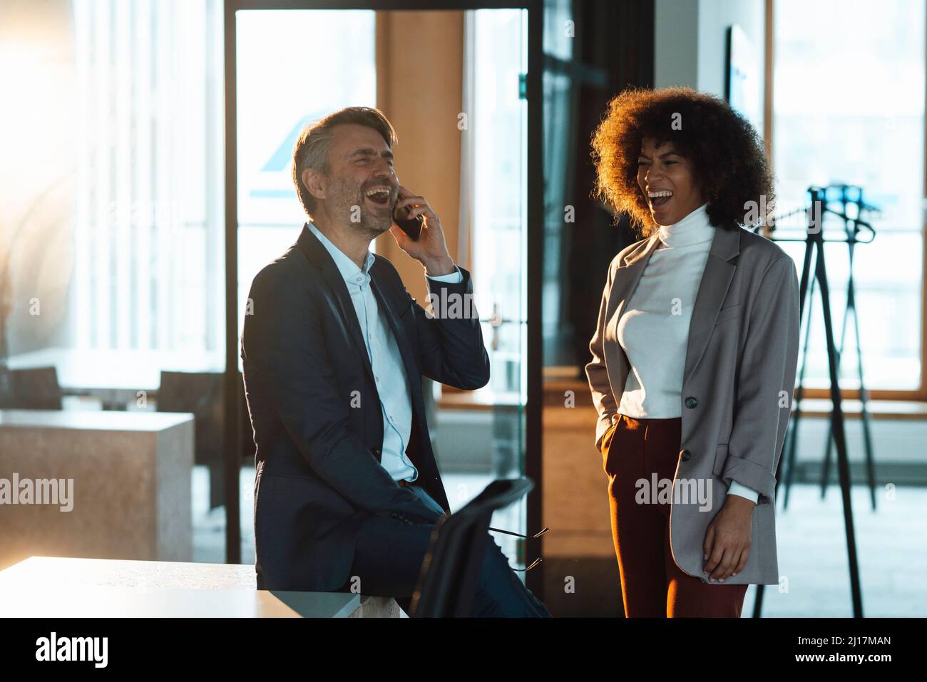 Work people talking positive High Resolution Stock Photography and ...