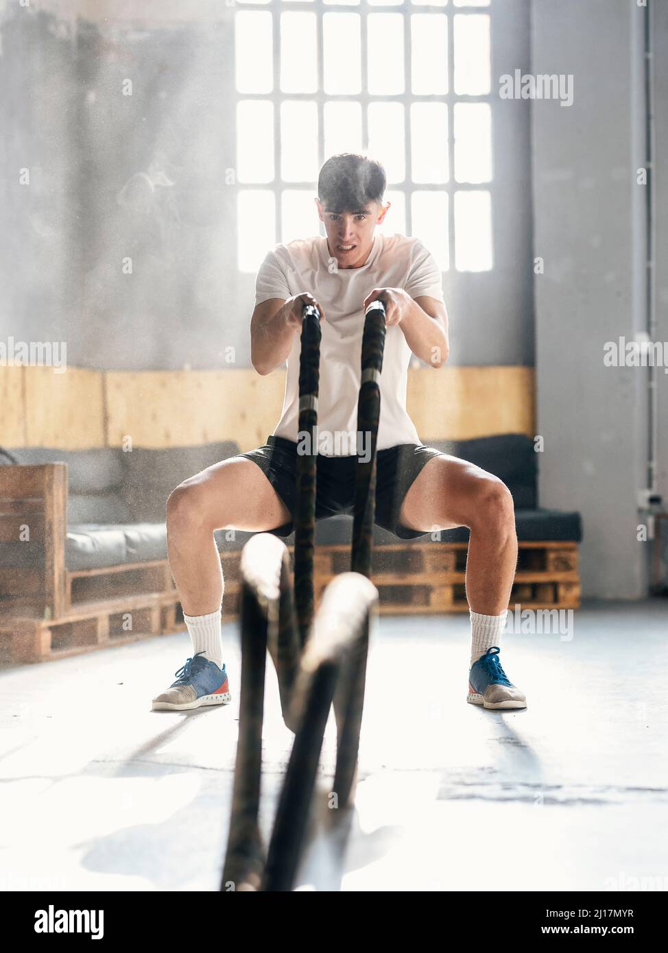 Exercising battle ropes person in hi-res stock photography and images ...