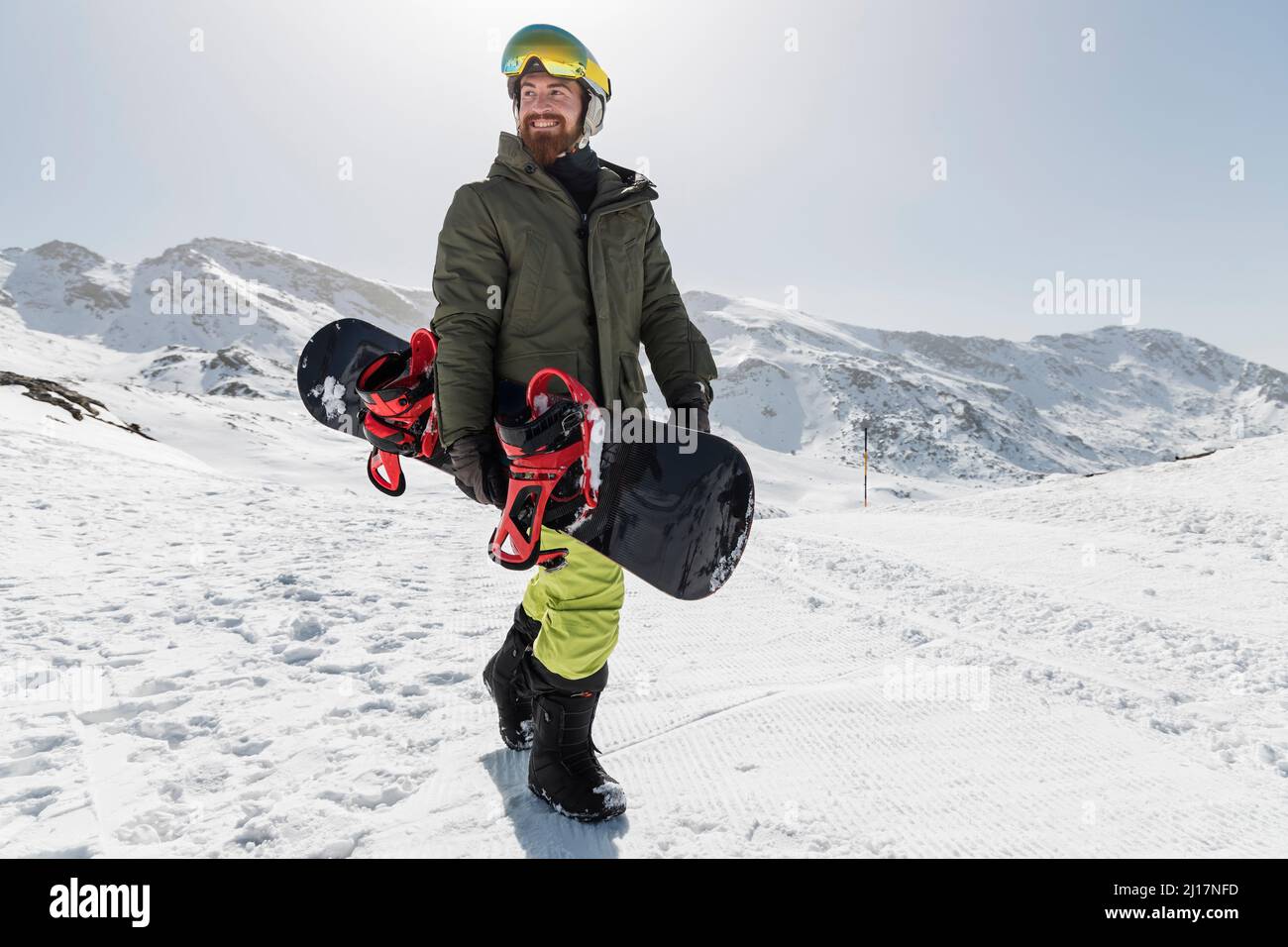 Young happy man skiing hi-res stock photography and images - Alamy