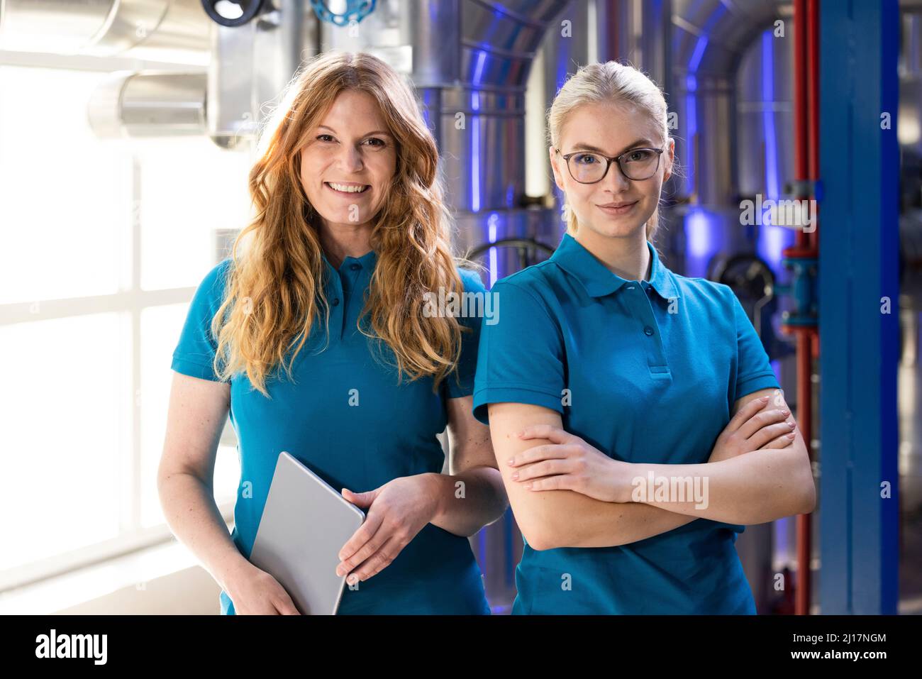 Smiling standing communication authority hi-res stock photography and images - Alamy