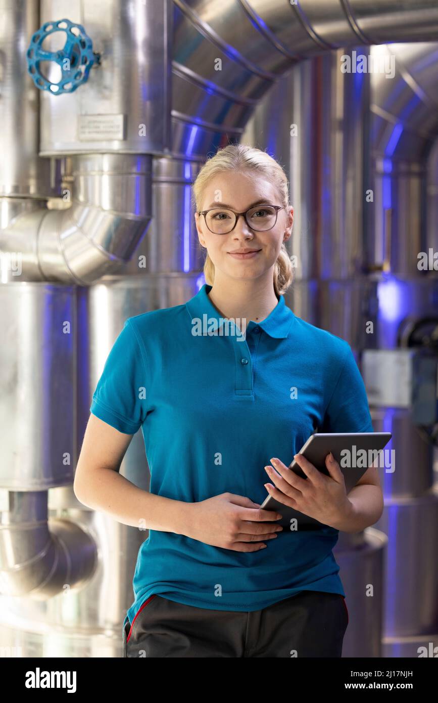 Communication authority standing smiling holding hi-res stock ...