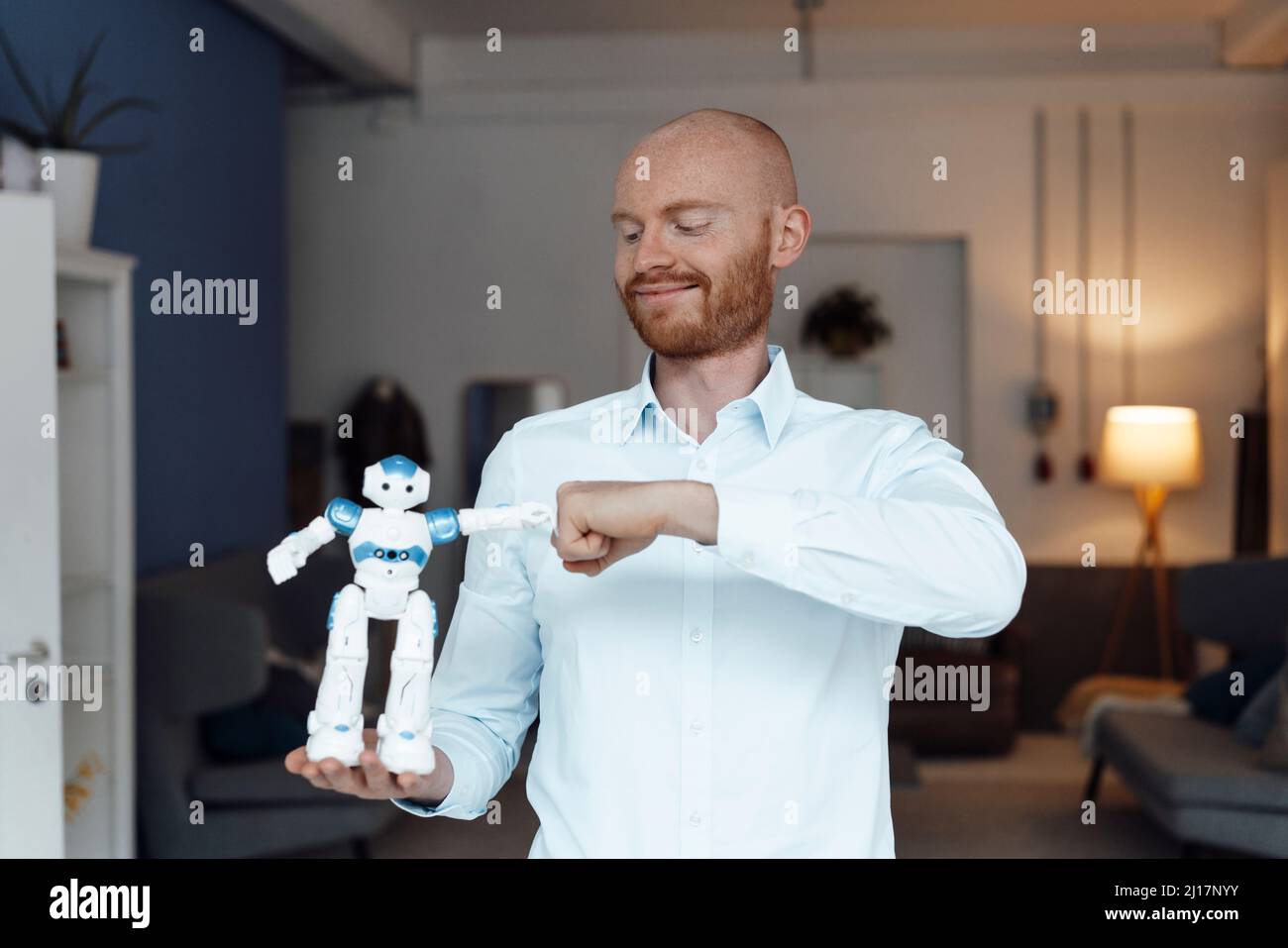 Robot fist bump hi-res stock photography and images - Alamy
