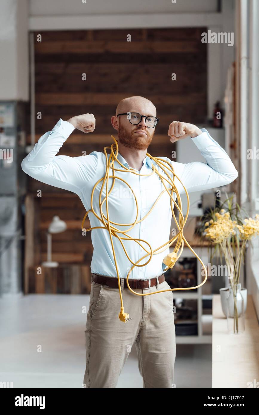 Man flexing muscles and office hi-res stock photography and images - Alamy