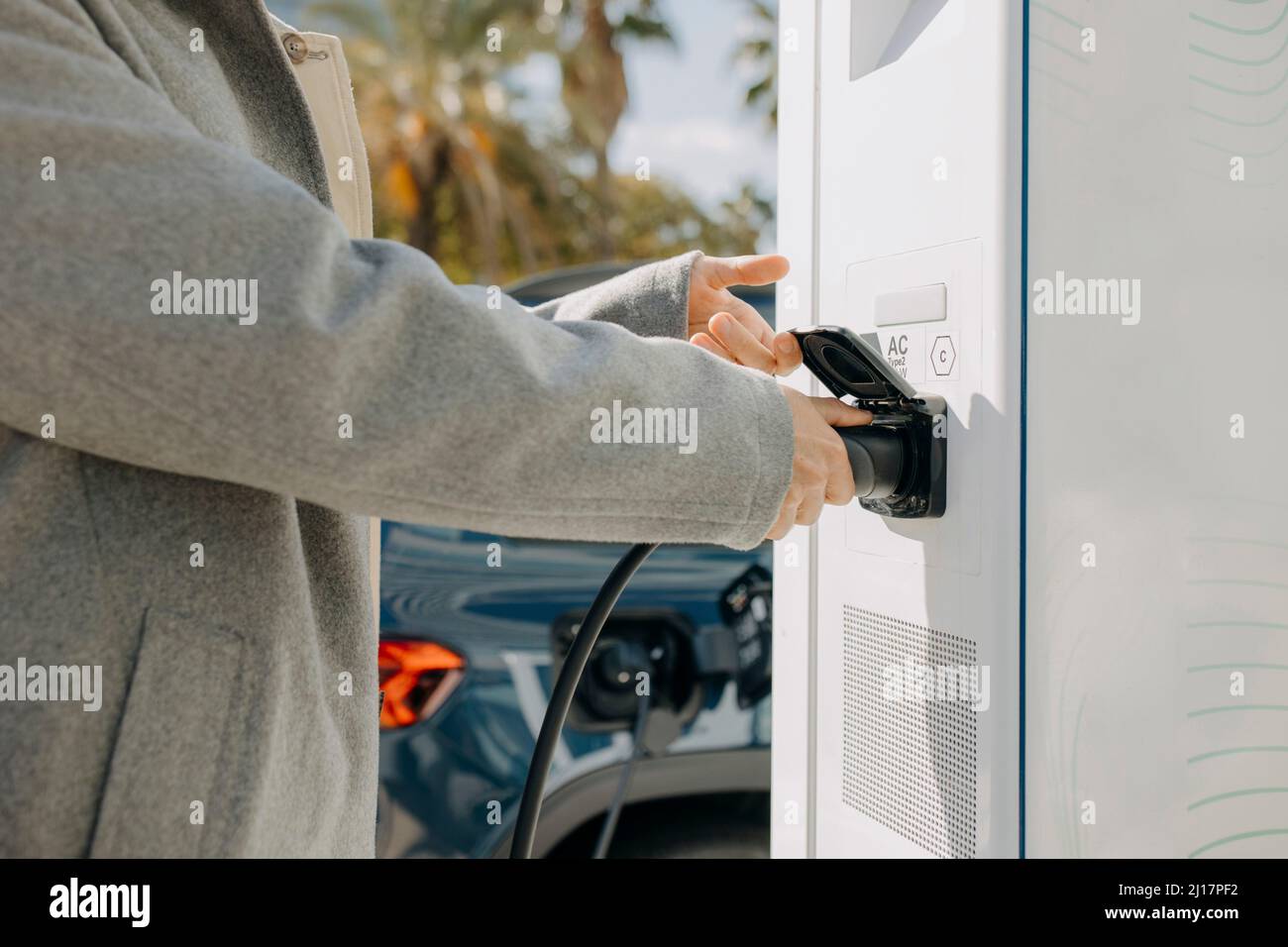 Man plugging in power hi-res stock photography and images - Alamy