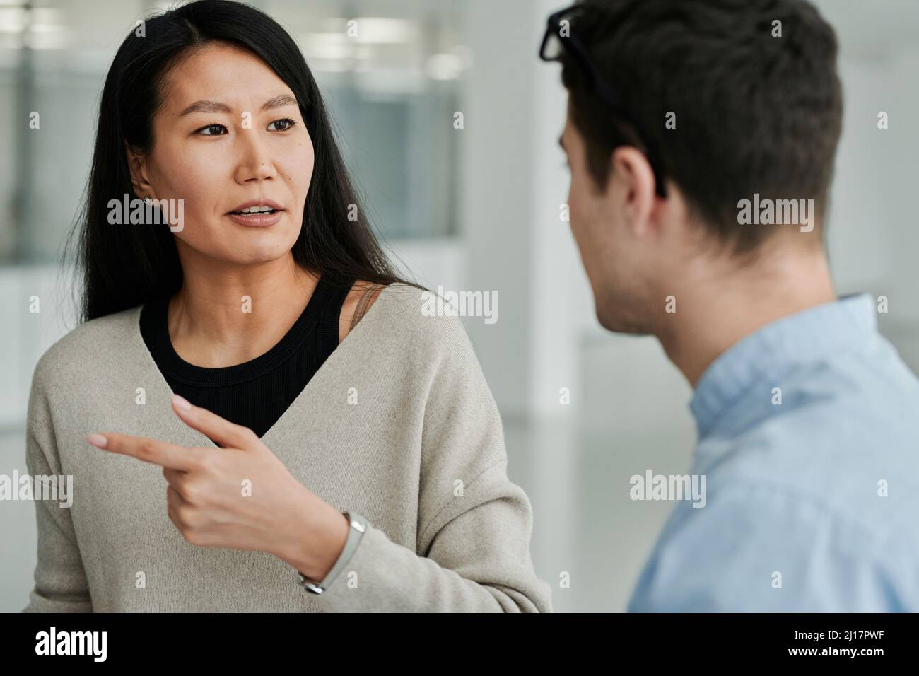 Group talking hand gesture hi-res stock photography and images - Alamy