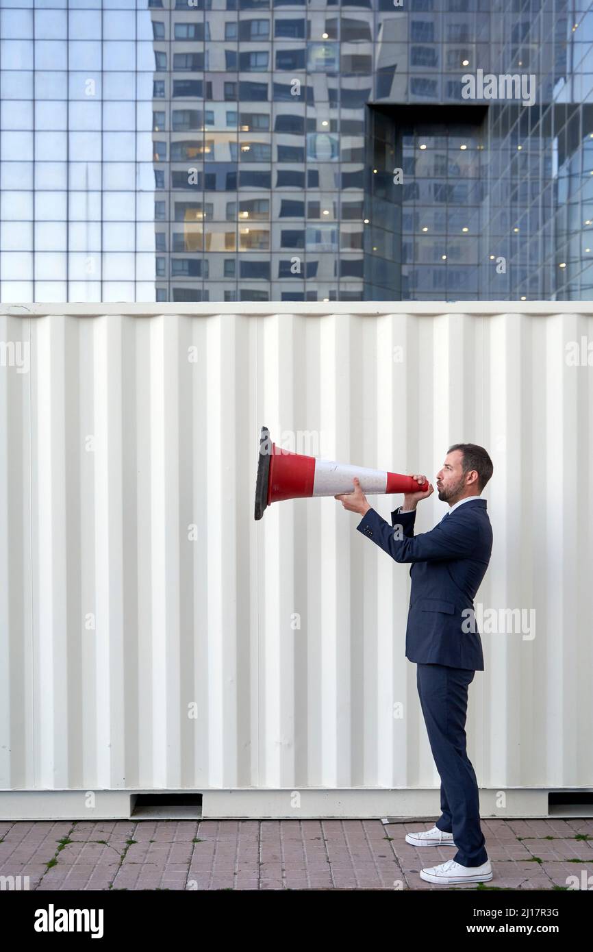 Man shouting through megaphone High Resolution Stock Photography and ...