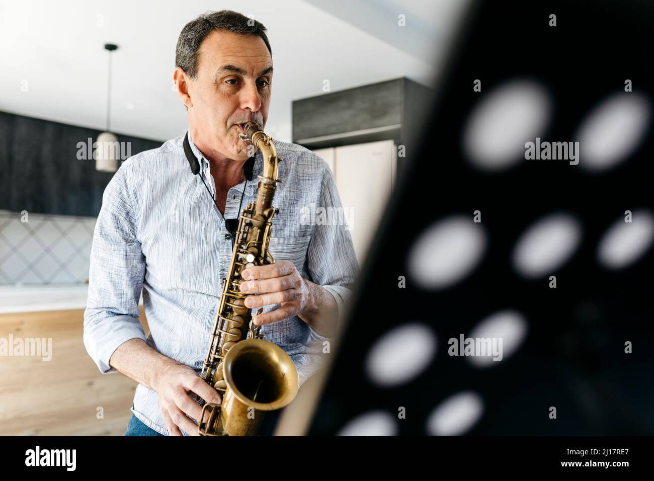 Practicing saxophone hi-res stock photography and images - Alamy