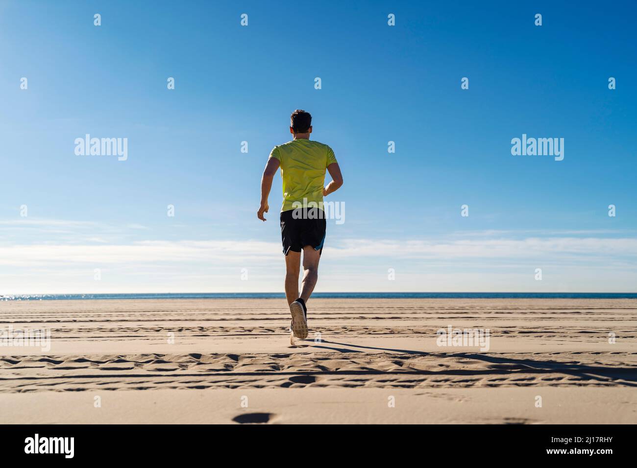 Male athlete beach hi-res stock photography and images - Alamy