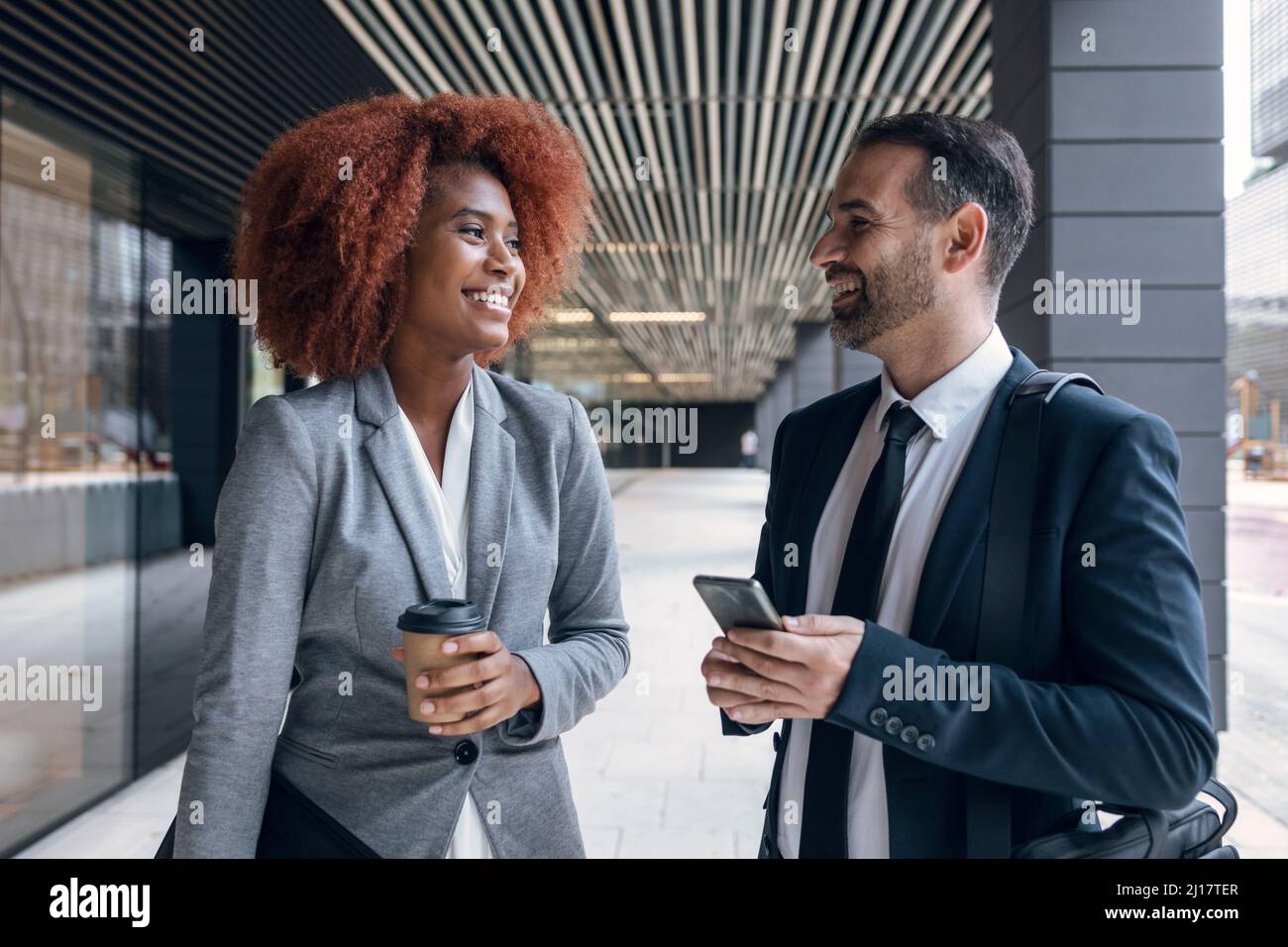 Business colleagues talking hi-res stock photography and images - Alamy