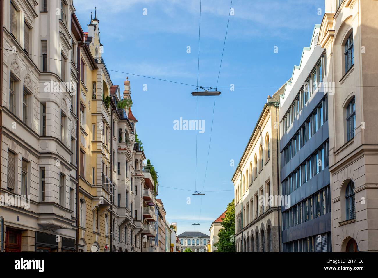Power lines hanging between rows townhouses hi-res stock photography ...