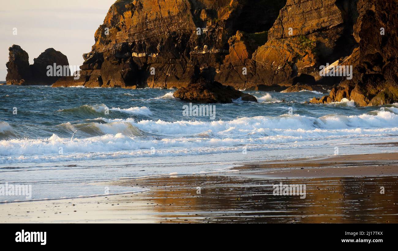 Coastal view looking north along the seashore where it meets the the ...