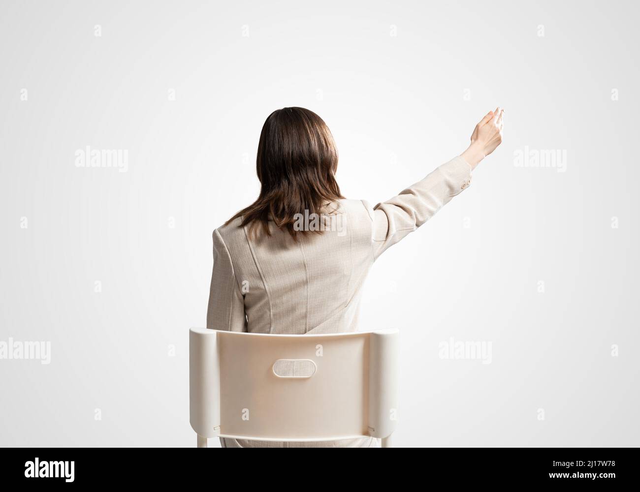 Woman presenting or something demonstrate Stock Photo - Alamy
