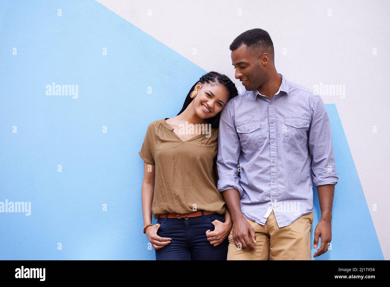 Shes the only one for me. Portrait shot of a young couple leaning ...