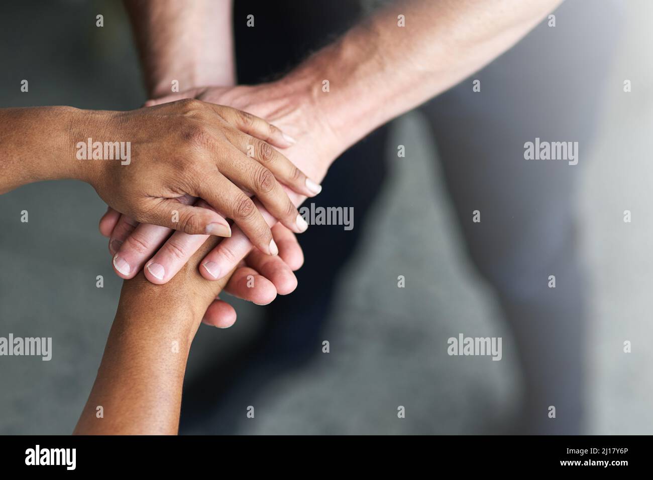 The birth of a team. Cropped shot of two peoples hands together in ...