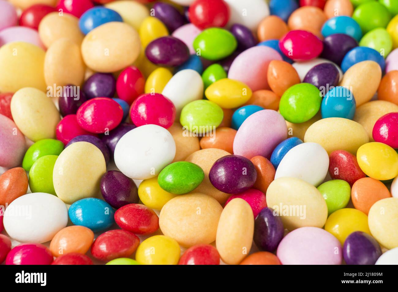 Large group of candies, colorful background, red, blue, yellow, pink ...