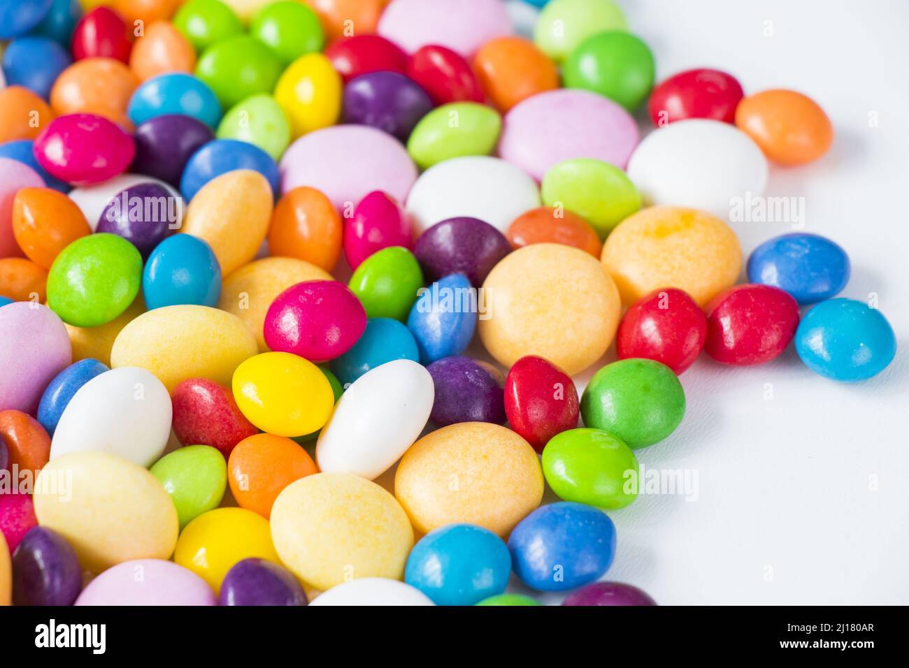 Large group of candies, colorful background, red, blue, yellow, pink ...
