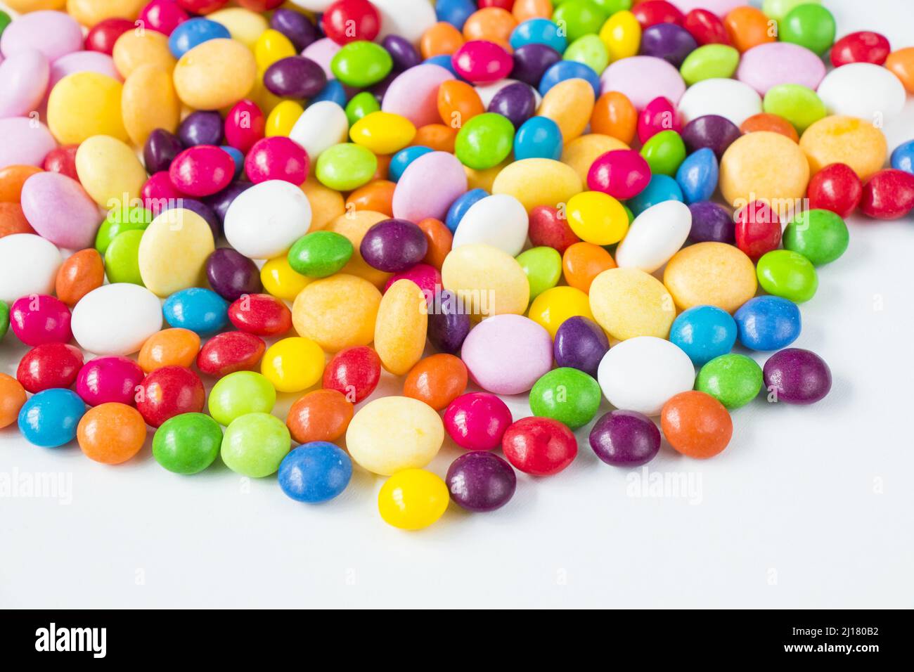 Large group of candies, colorful background, red, blue, yellow, pink ...