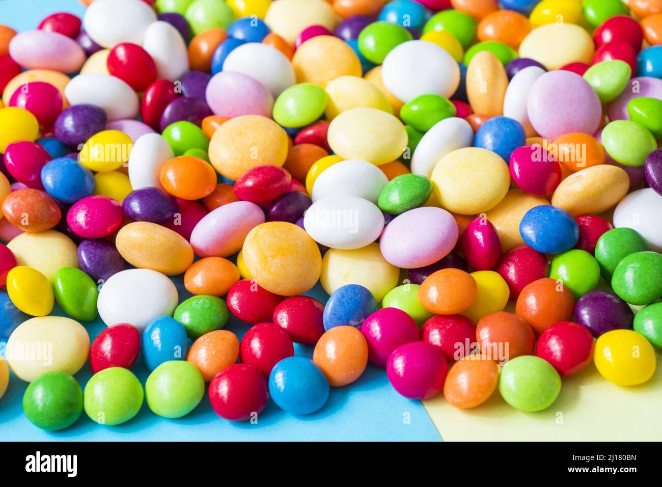 Large group of candies, colorful background, red, blue, yellow, pink ...