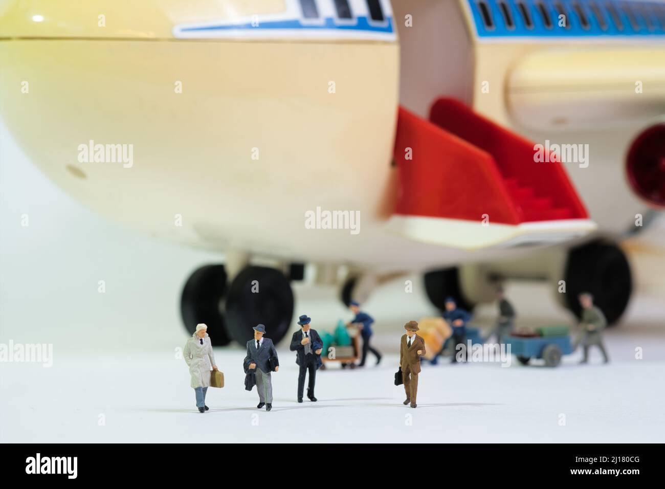 Airplane passengers getting off hi-res stock photography and images - Alamy