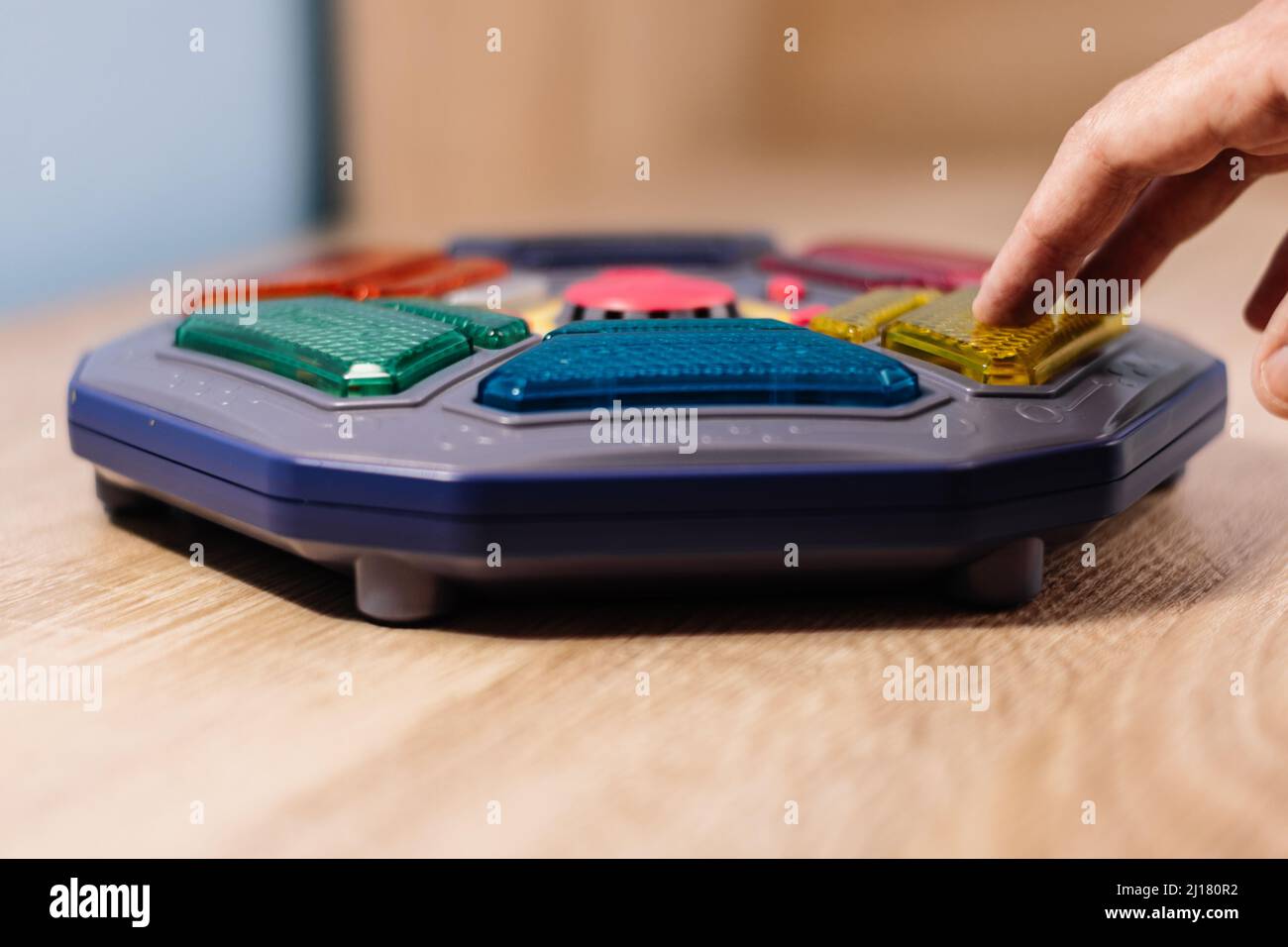 Man playing board games to exercise his memory. Unrecognizable man ...