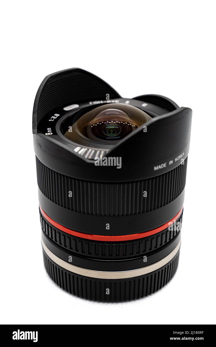 Vertical shot of an 8mm wide-angle lens with f2.8 aperture isolated on ...