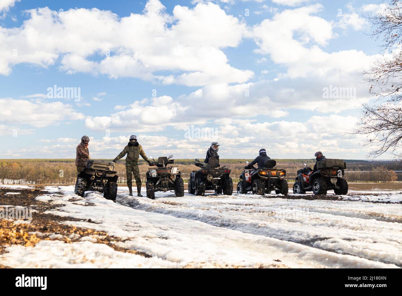 A row of people with their ATVs during winter in Kharkiv, Ukraine Stock ...