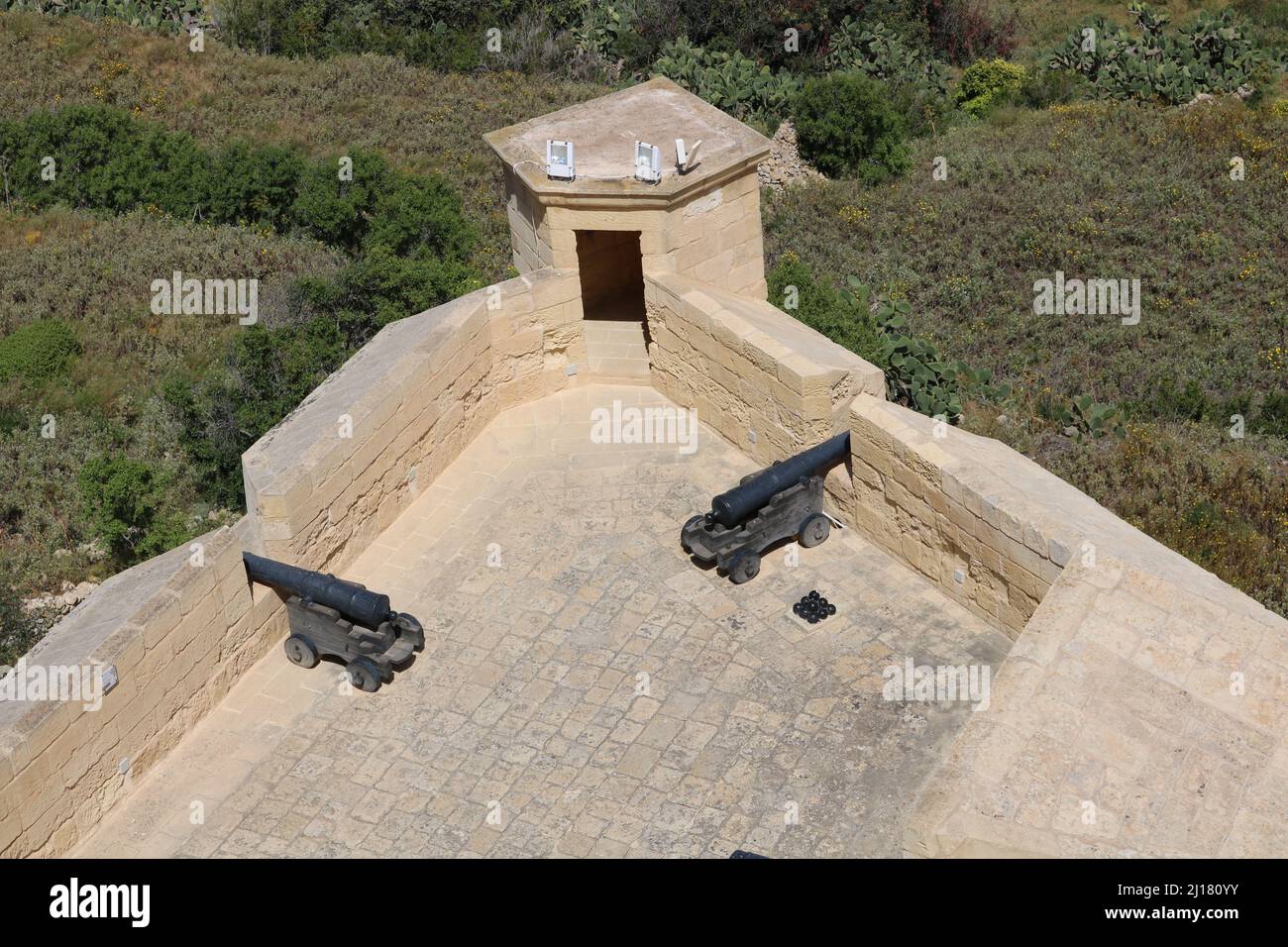 An aerial view of cannons on top of the castle in Malta Stock Photo - Alamy