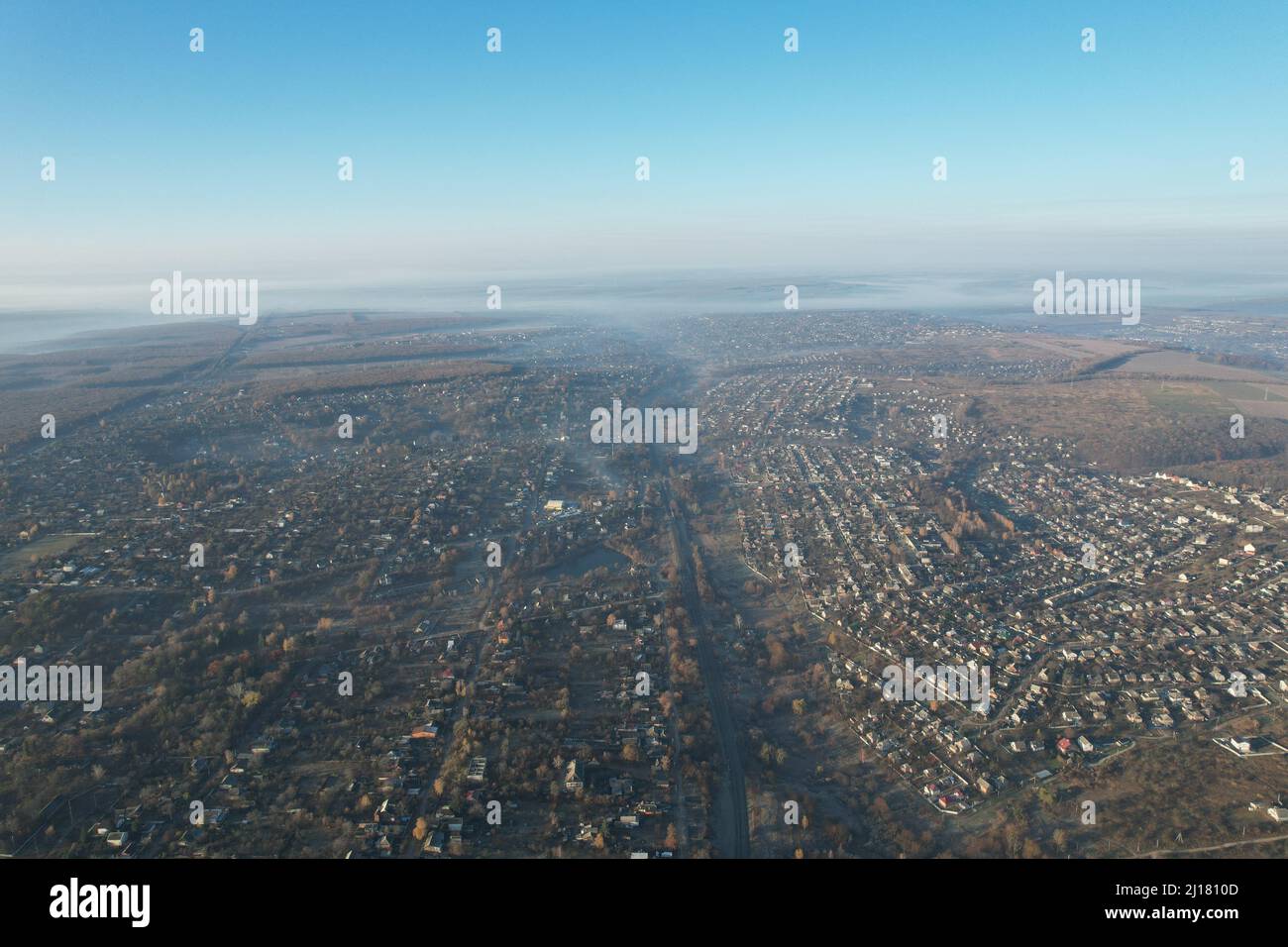 The aerial shot of the Ukrainian village near Kharkiv city from a drone ...