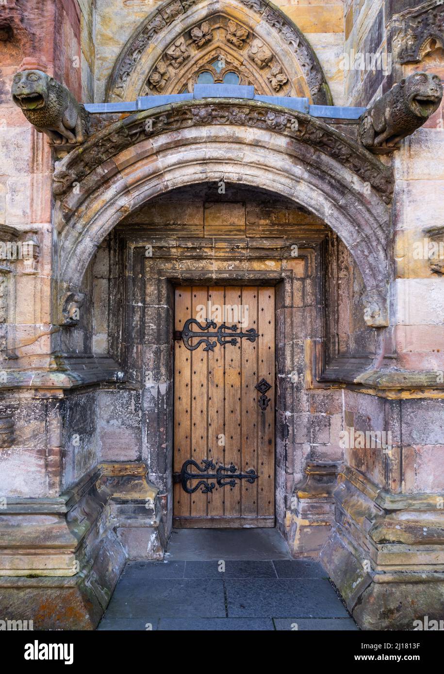 Gothic chapel door with archway Stock Photo - Alamy
