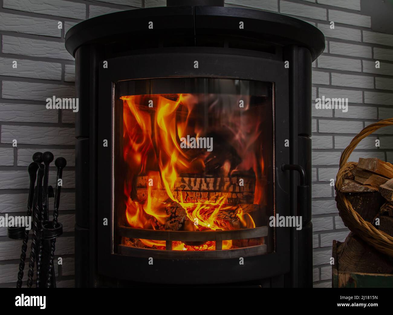 Fire burns in stove orange hi-res stock photography and images - Alamy