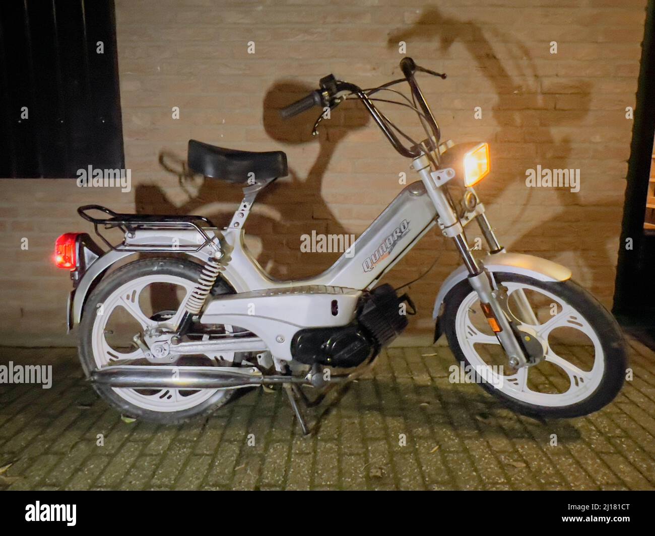 A beautiful shot of a Tomos with lights on Stock Photo - Alamy